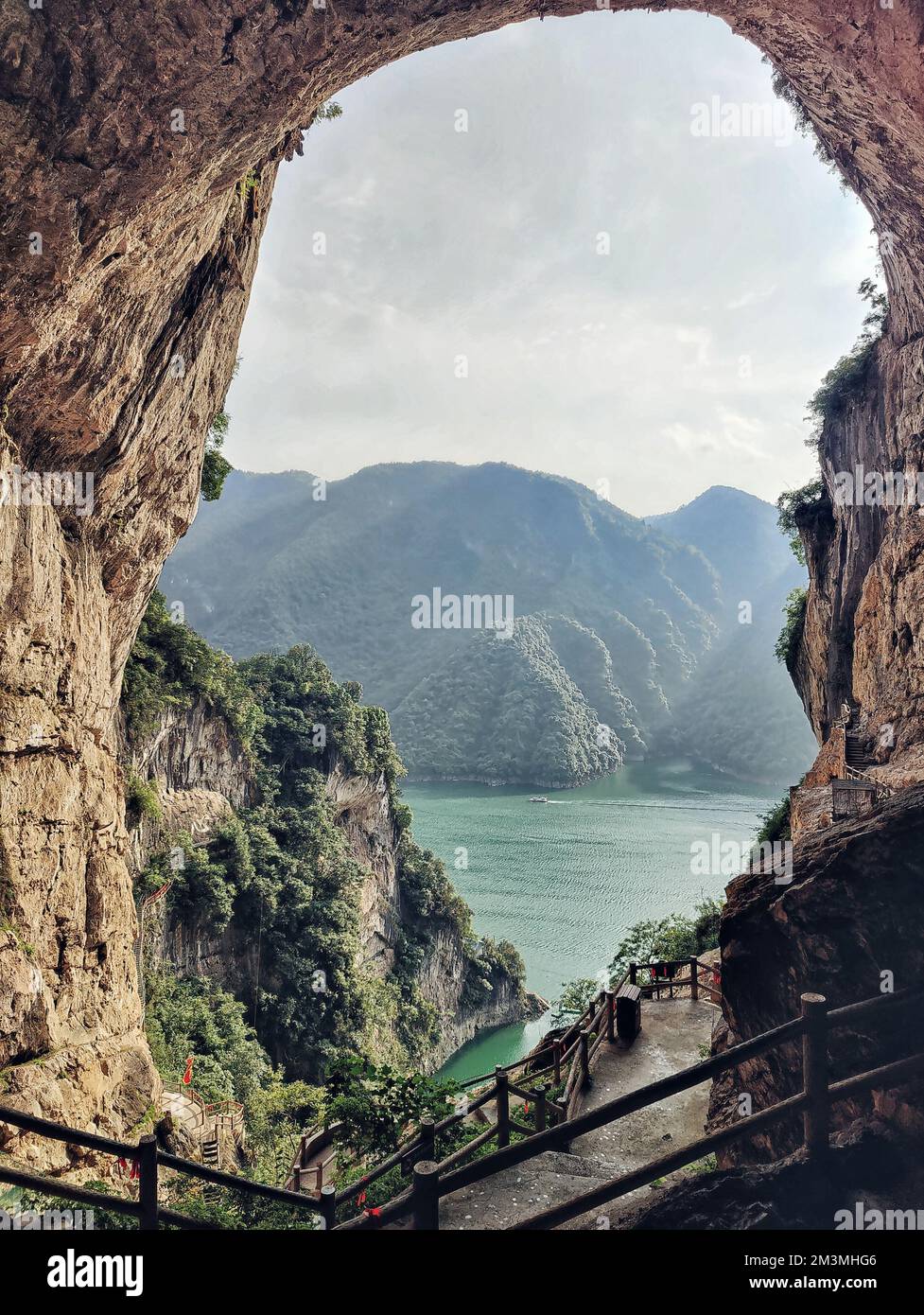 A vertical shot of a cave and the sea Stock Photo - Alamy