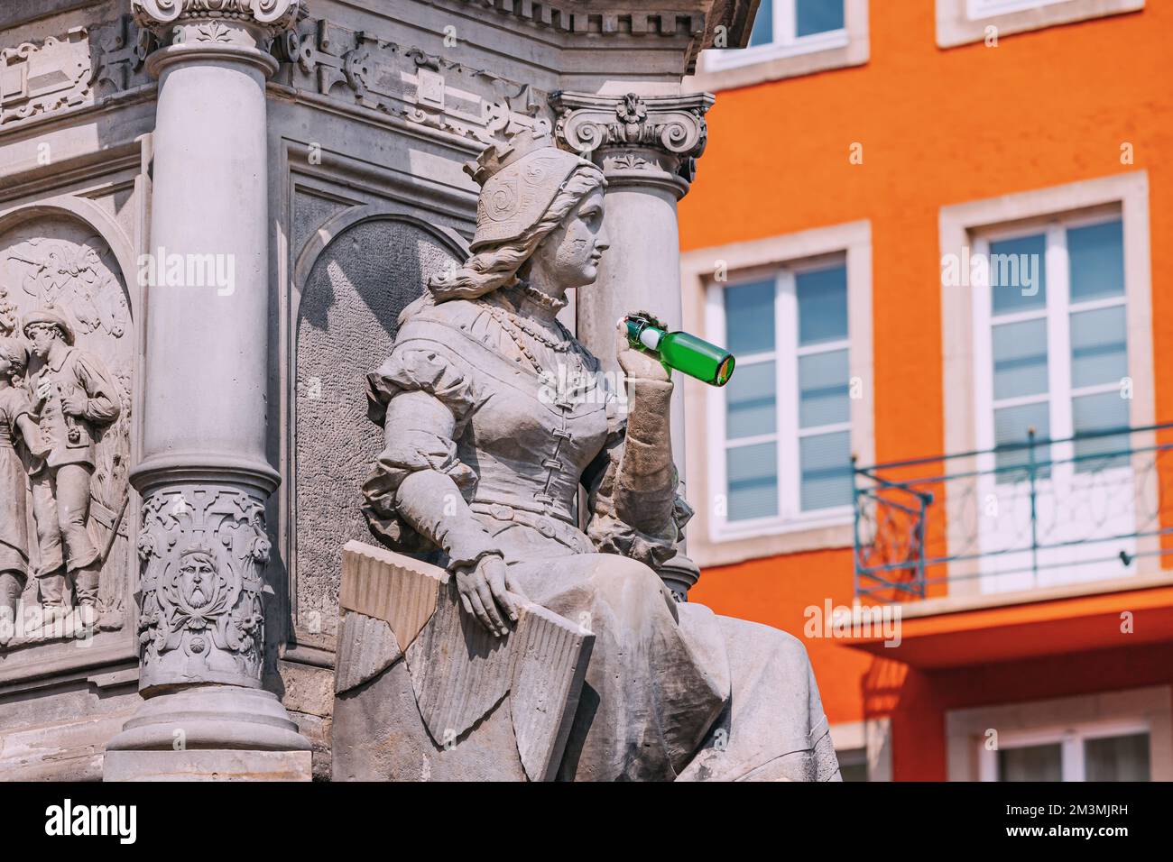 Statue in Cologne old town drinking beer. German Octoberfest and joke ...