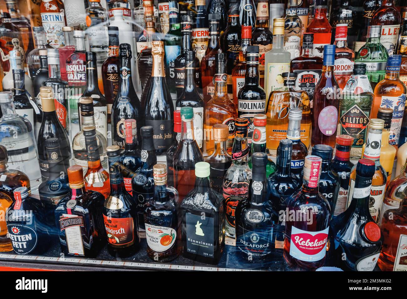 29 July 2022, Cologne, Germany: Assortment of alcohol and liquor at bar ...