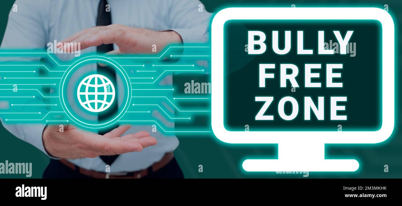 Hand writing sign Bully Free Zone. Concept meaning Be respectful to ...