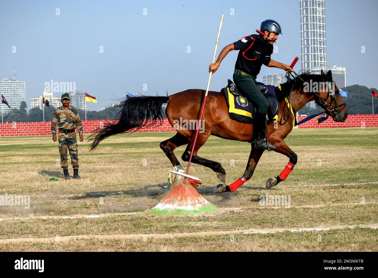 An Indian Army personnel is seen riding a horse during an army ...