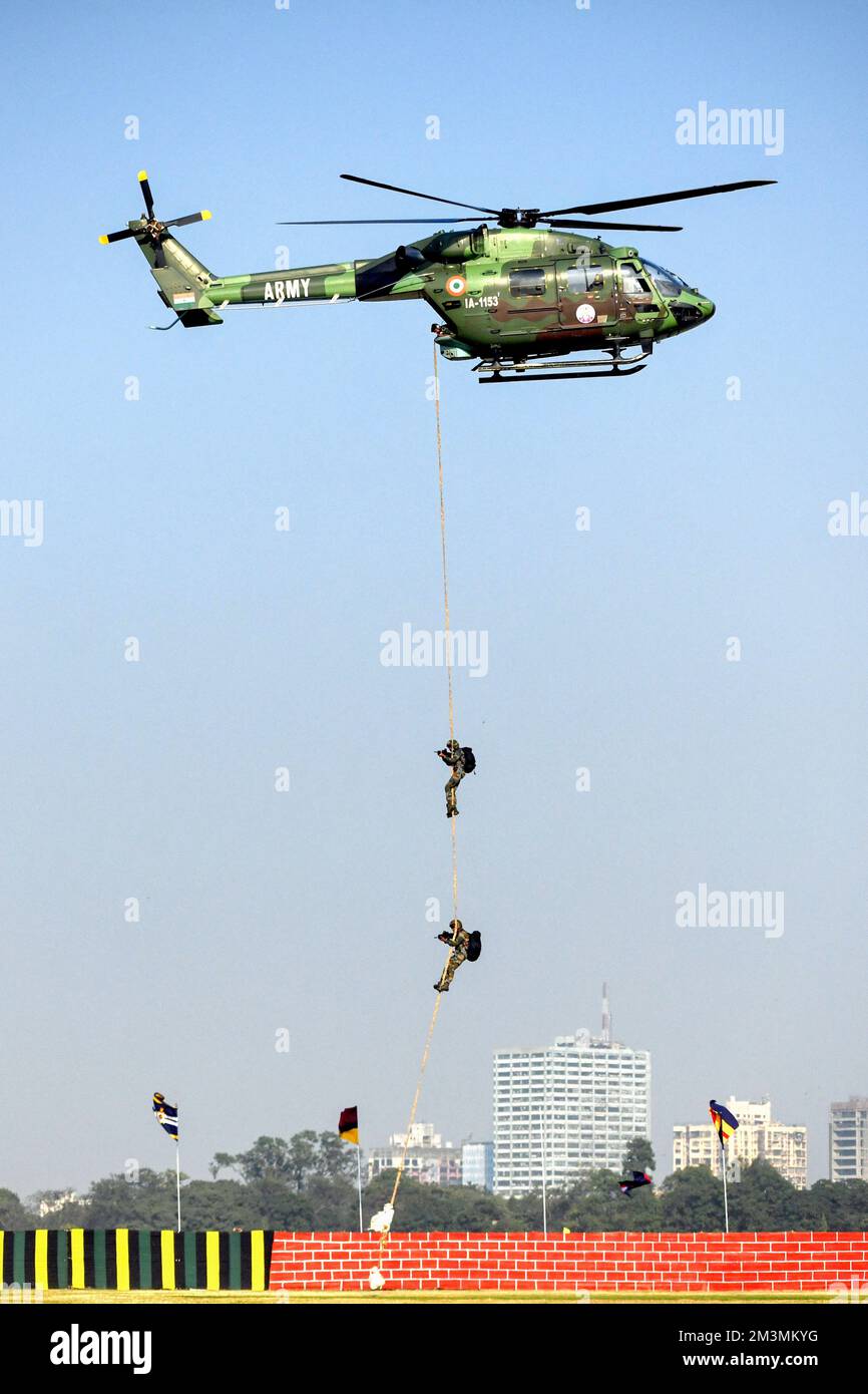 Indian Army commandos are seen repelling up from a helicopter during ...