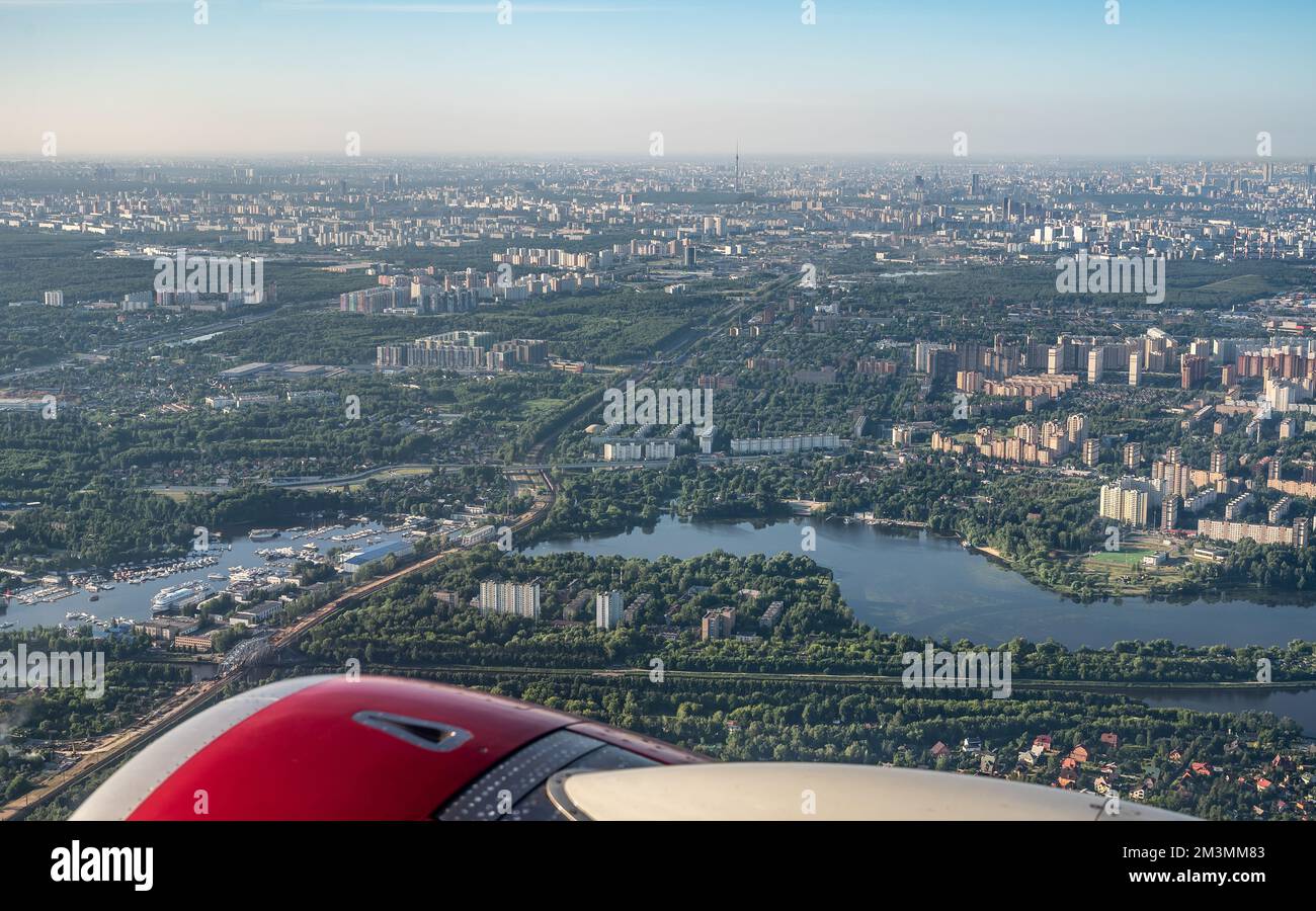 aerial photo of large city from an airplane window. view of city of ...