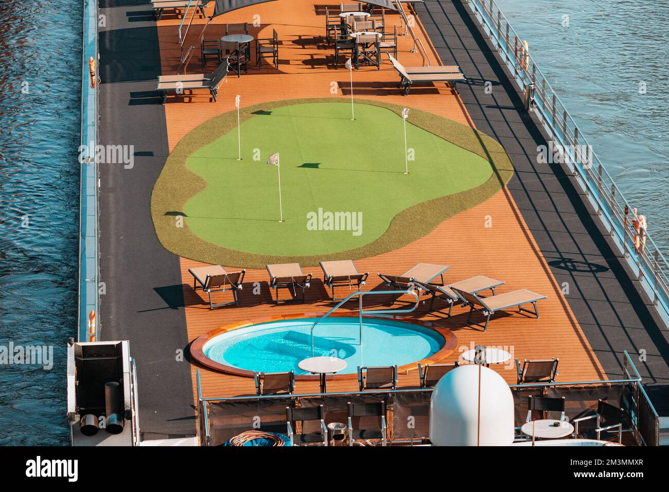 A mini golf course and a small swimming pool on the deck of a luxury ...