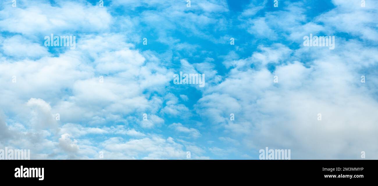 Panoramic sky with white clouds. Sky panorama. Blue cloudy sky panorama. Panoramic Blue sky and ...