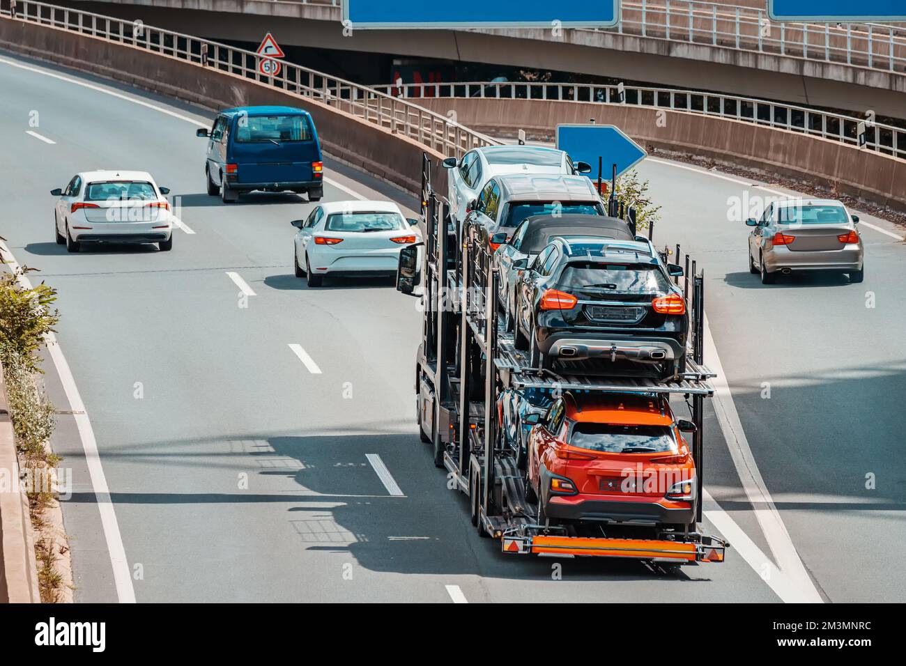 Aerial photo of a truck carrier or transporter with cars as cargo ...