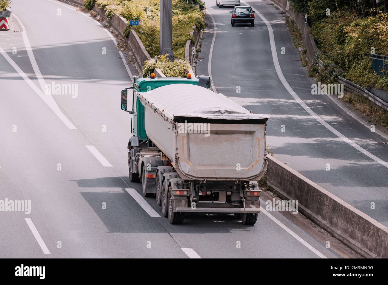 Aerial view of a dump truck driving on the highway Stock Photo - Alamy