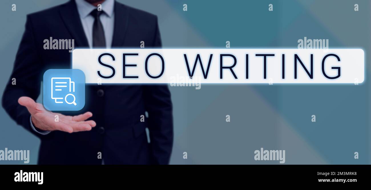 Hand writing sign Seo Writing. Internet Concept grabbing the attention ...