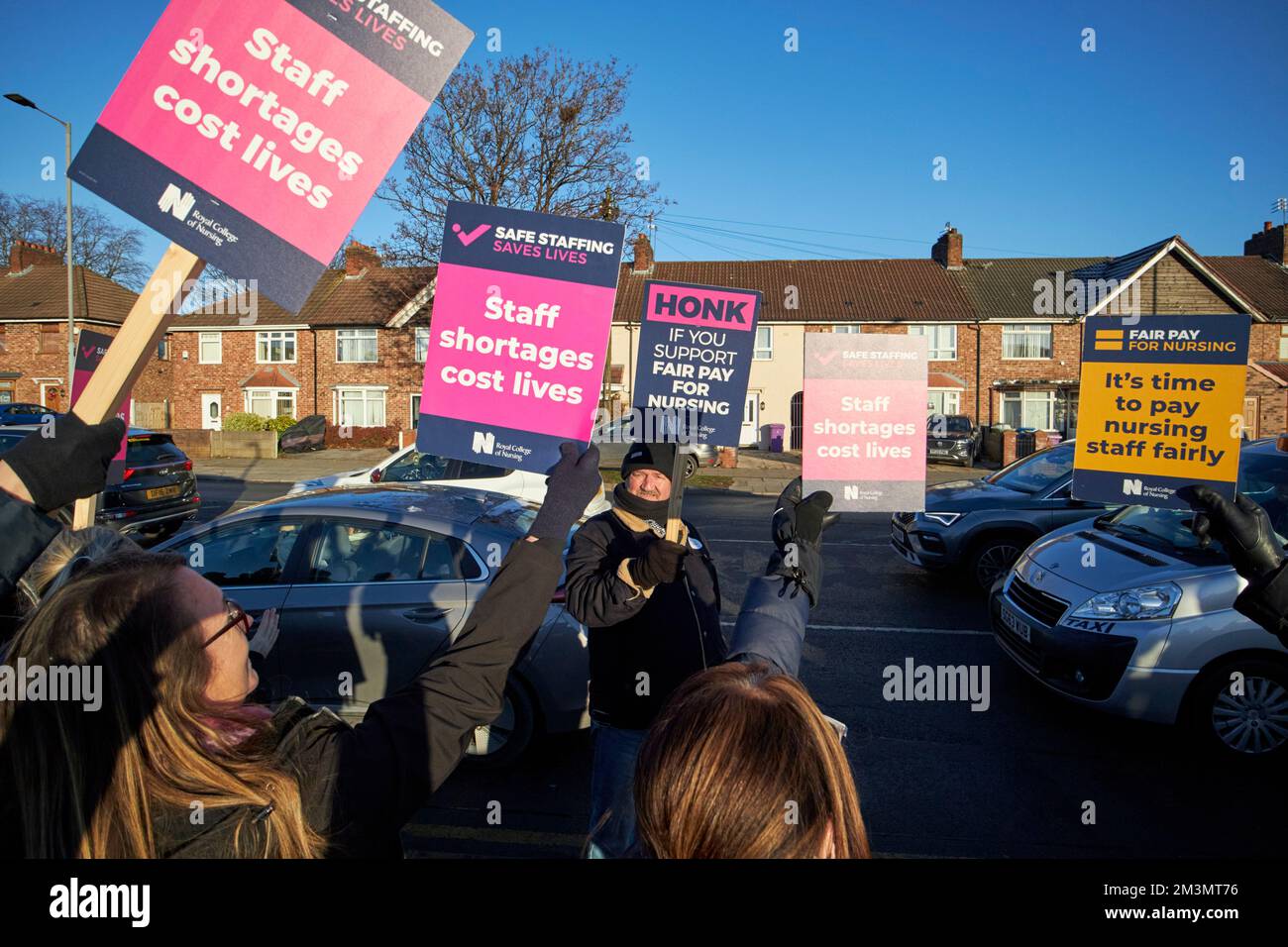 cars passing showing support to nurses on the picket line during strike ...