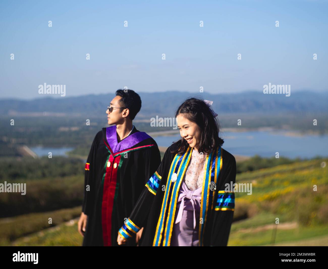 The graduate wore a gown from a university in Thailand. For graduation ...