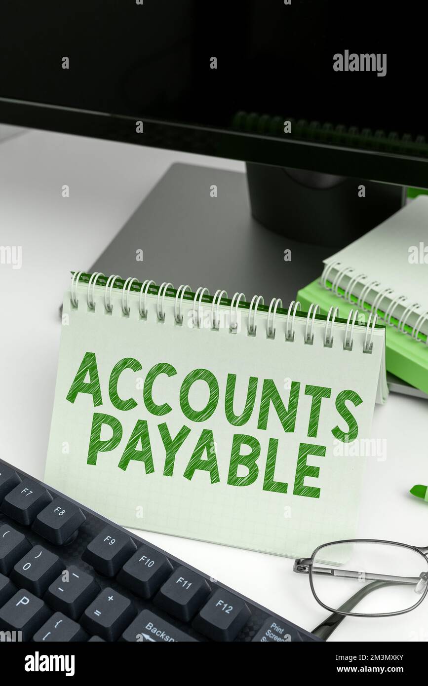 Hand writing sign Accounts Payable. Internet Concept money owed by a ...