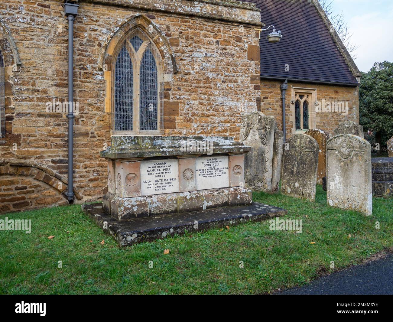Old gravestones and tomb in the churchyard of All Saints, Mears Ashby ...