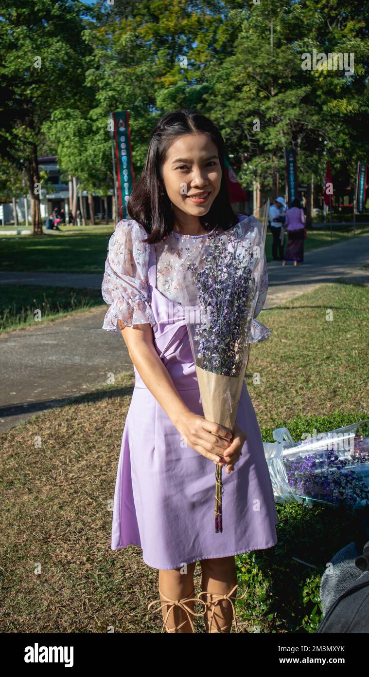 The graduate wore a gown from a university in Thailand. For graduation ...