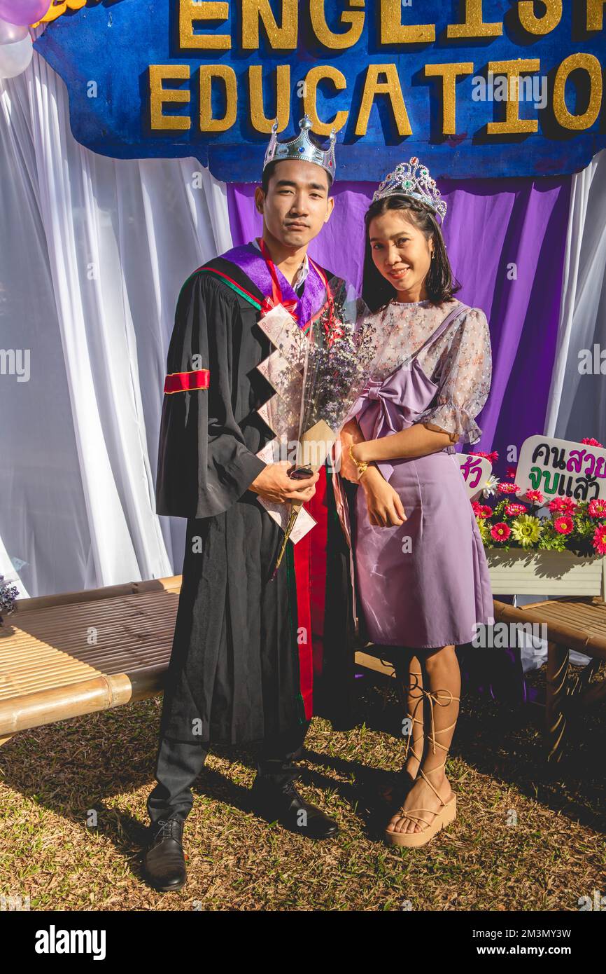 The graduate wore a gown from a university in Thailand. For graduation ...