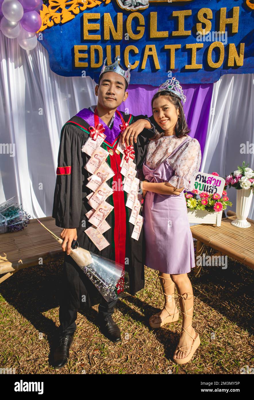 The graduate wore a gown from a university in Thailand. For graduation ...