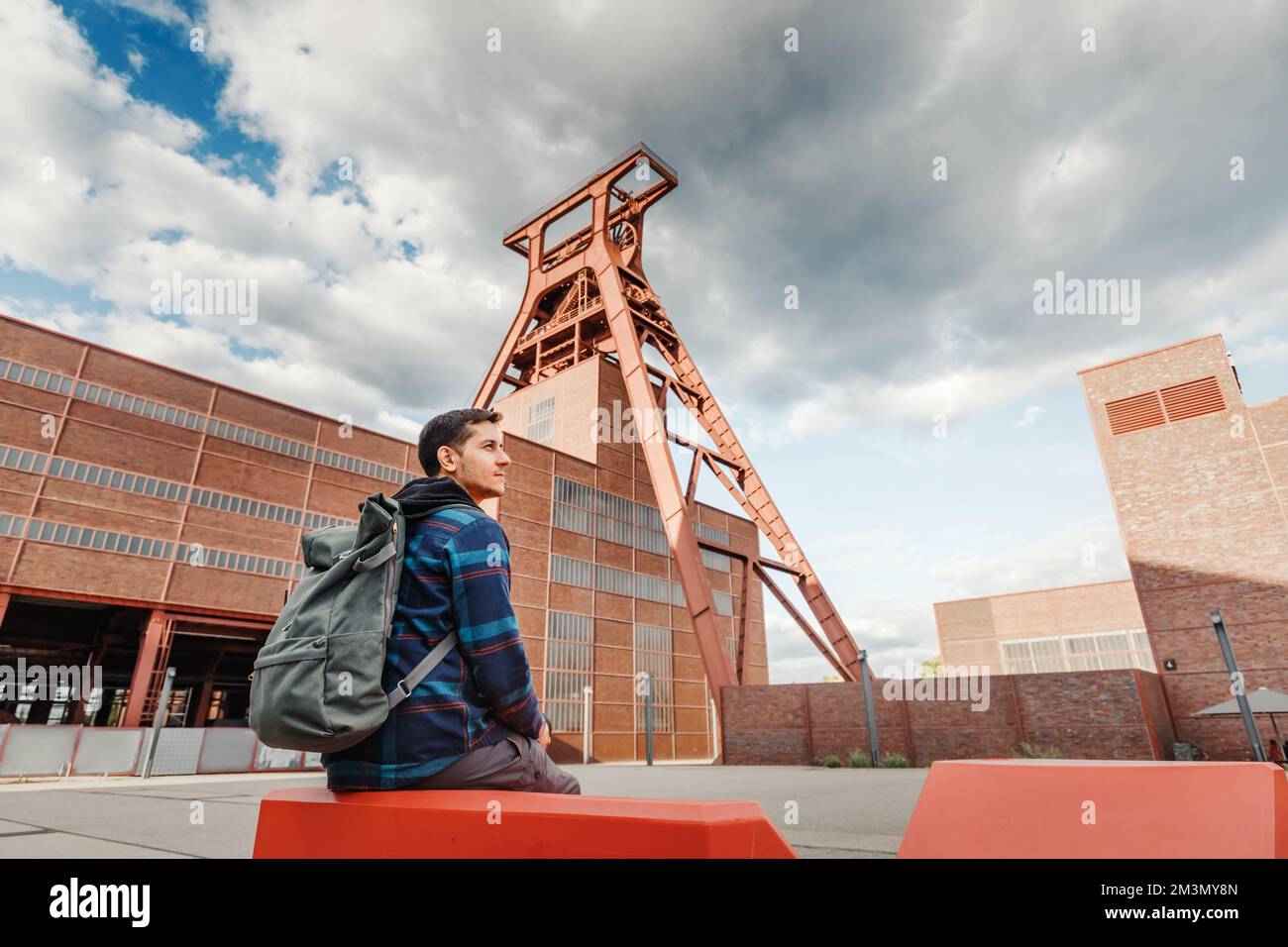 Tourist visiting industrial and urban design district in Zollverein ...