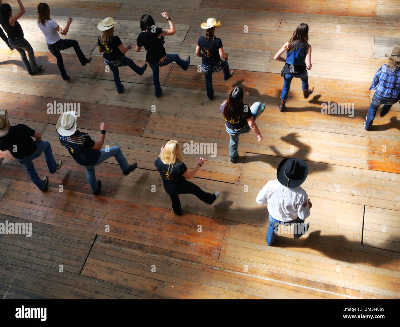 A top view of a group of traditional western folk dancing under the ...