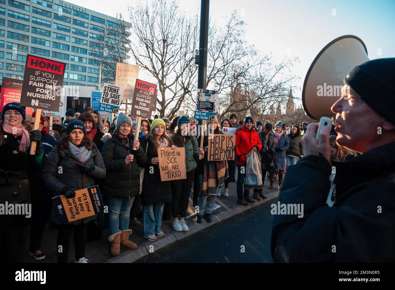 London, UK. 15th December, 2022. Nurses hold placards and signs at an ...