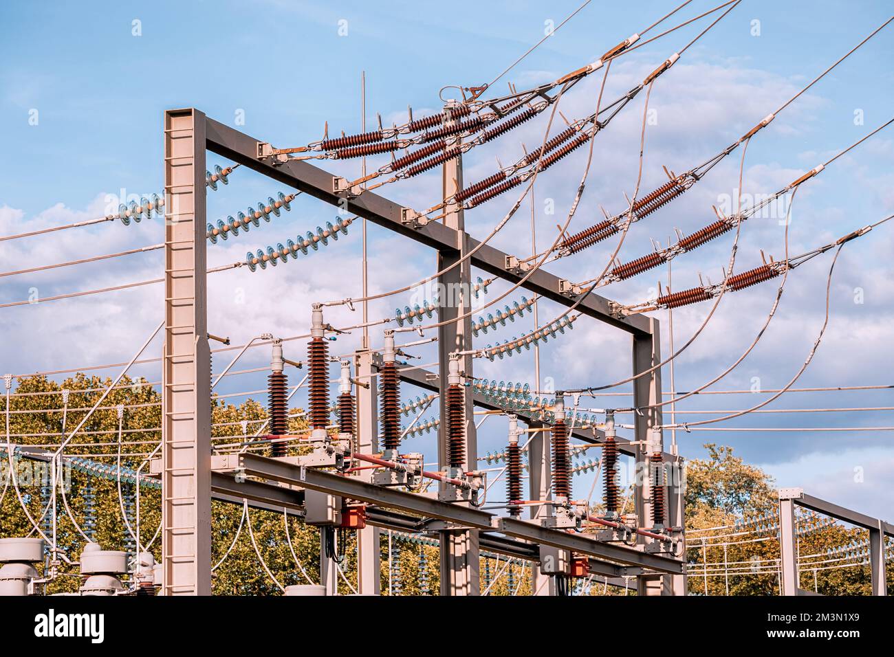 electrical substation with various voltage converters and transformers ...