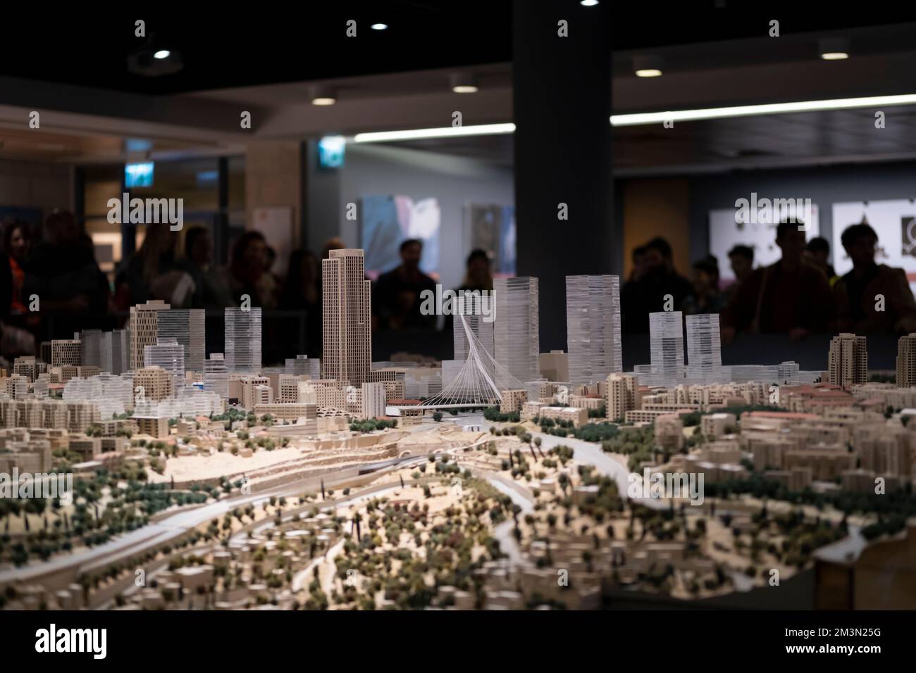Visitors view a 3D scale model of Jerusalem which enables viewers to ...