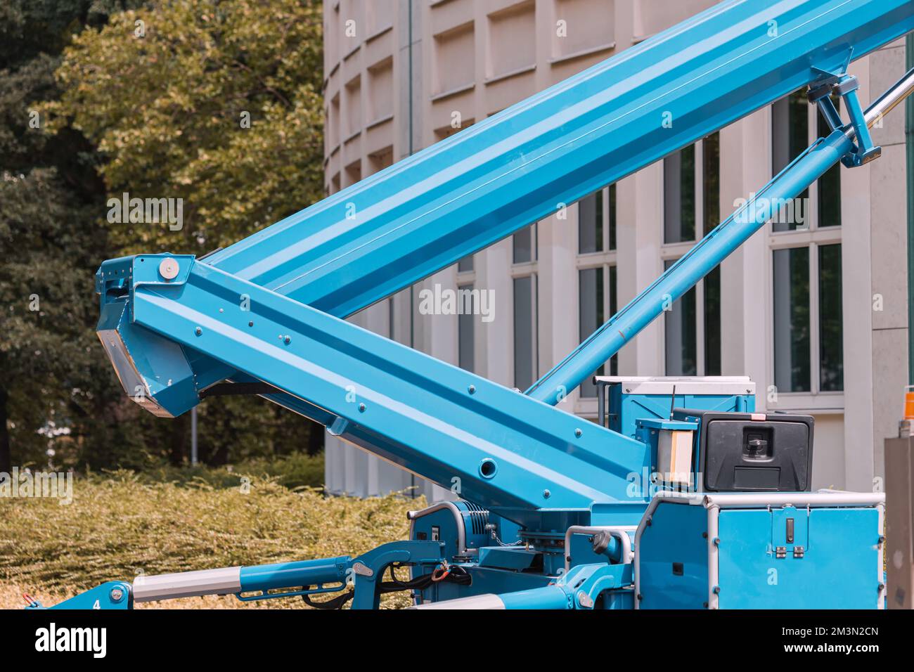 Industrial telescopic unmanned crane detail at a construction site ...