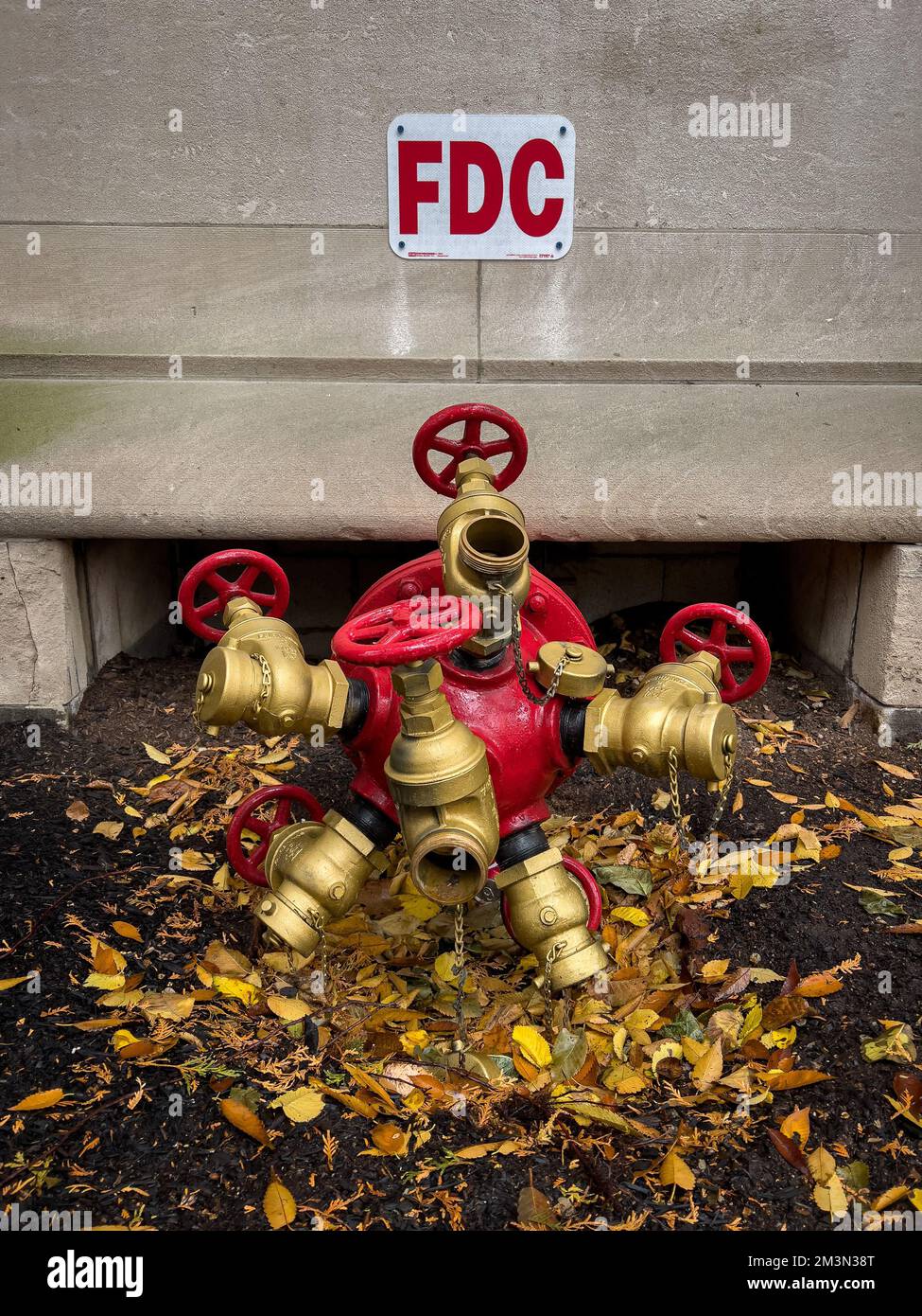 A vertical shot of a multiple connection of street fire sprinkler ...