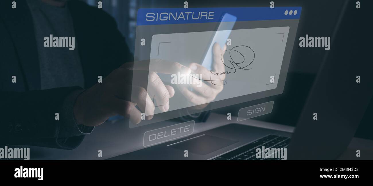 Man hand writing electronic signature on virtual display. Sign contract ...