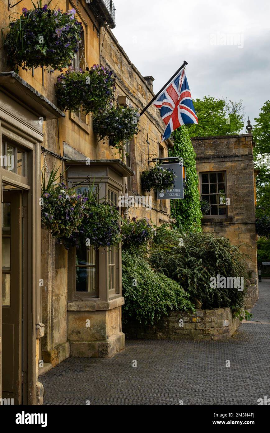 Box bay or canted window of Cotswold manor house in the market town of ...