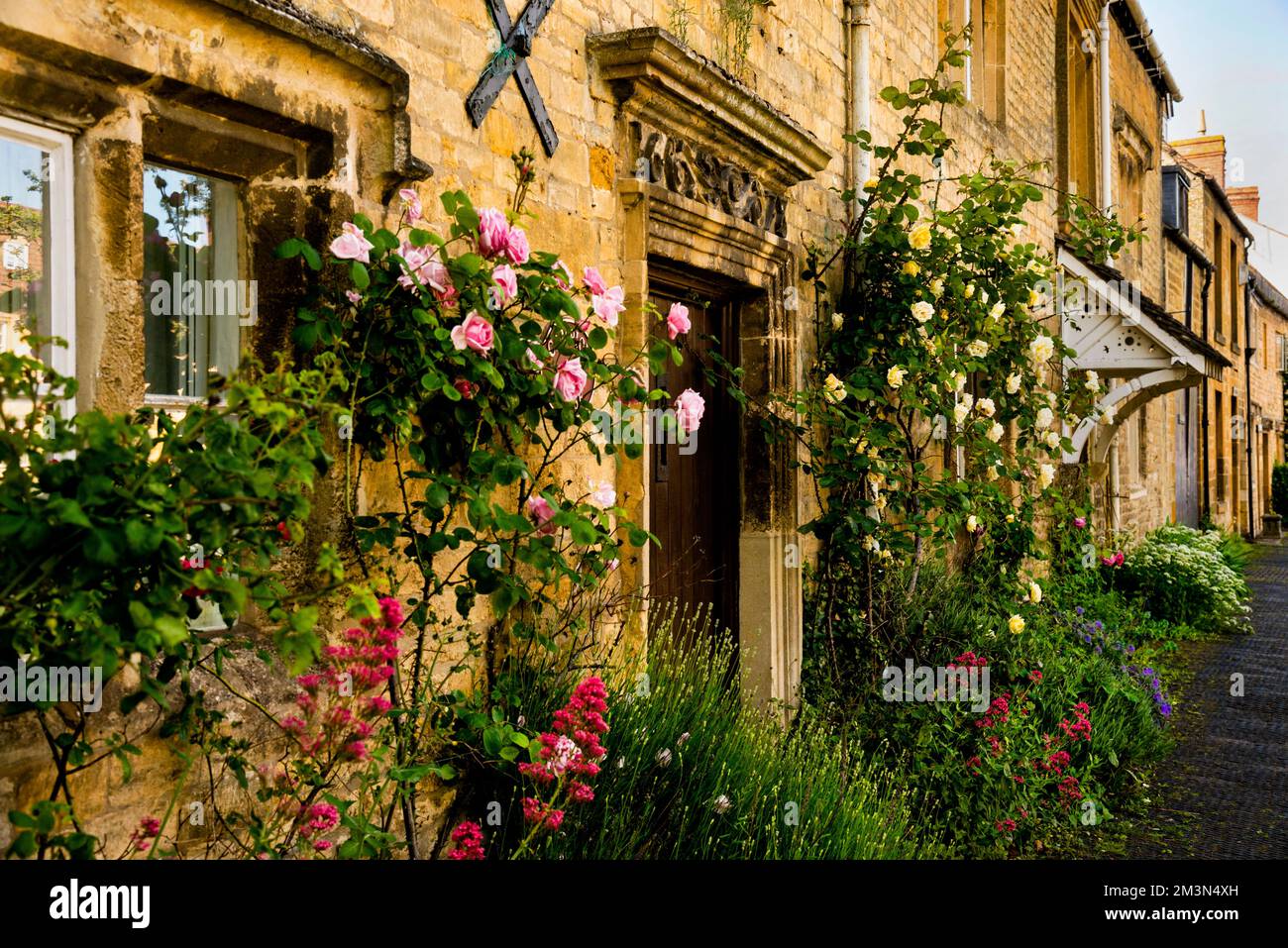 Metal crosses are the ends of ties that hold the walls together, a long ...