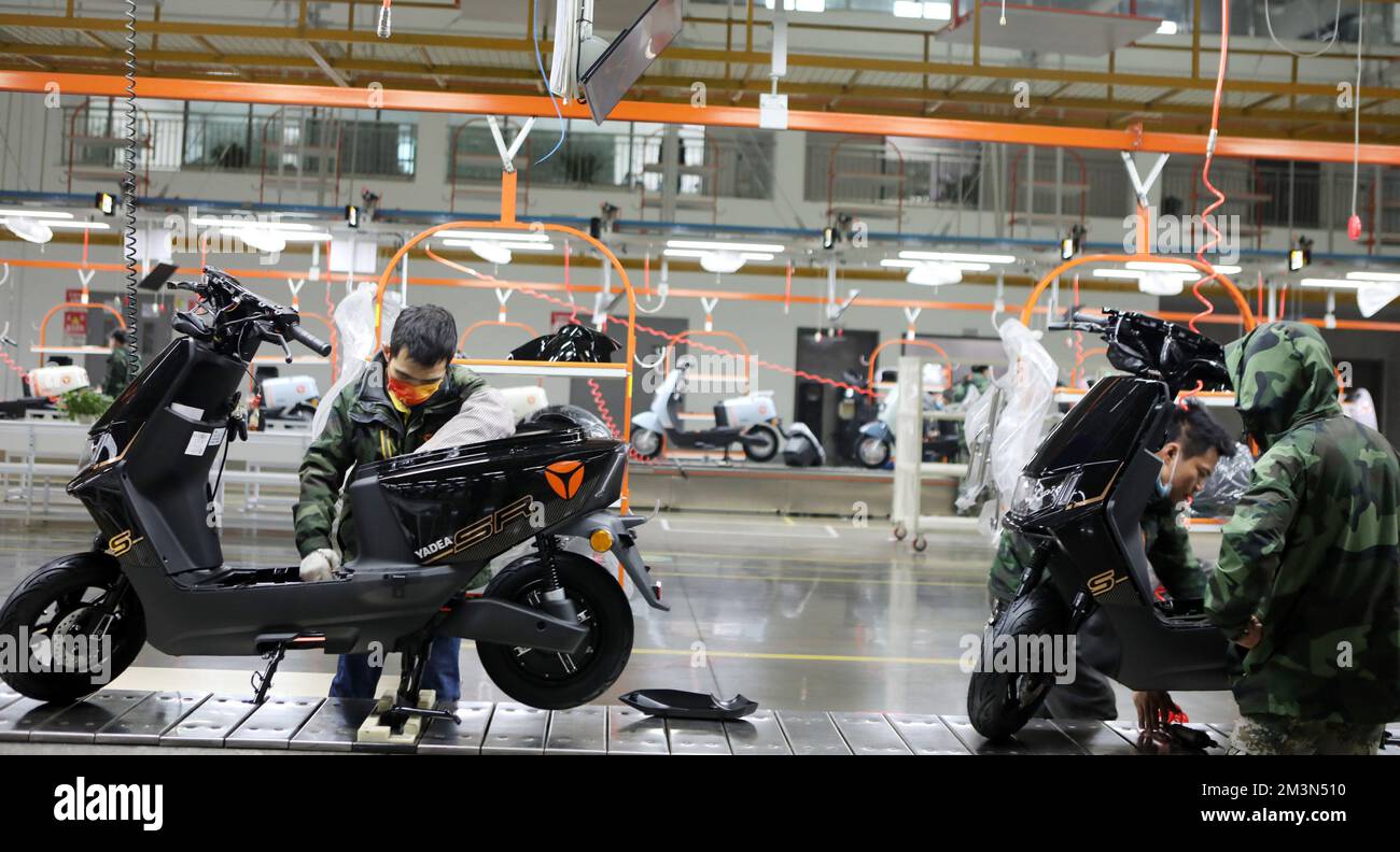 CHONGQING, CHINA - DECEMBER 16, 2022 - Employees work on a production ...