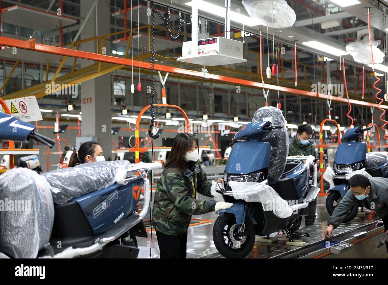 CHONGQING, CHINA - DECEMBER 16, 2022 - Employees work on a production ...