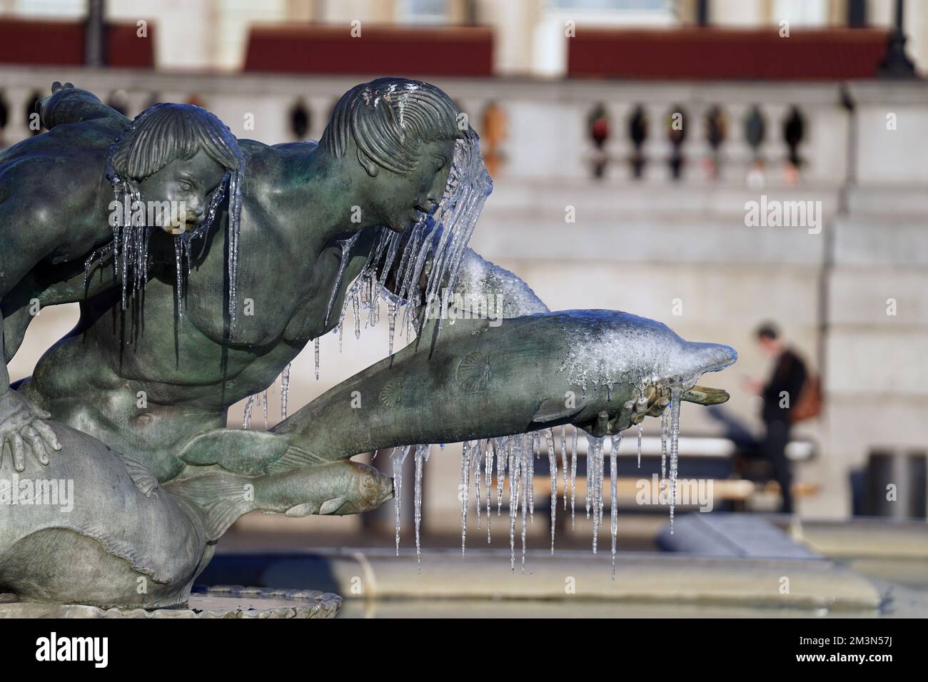 A frozen fountain in Trafalgar Square, central London. Snow and ice ...