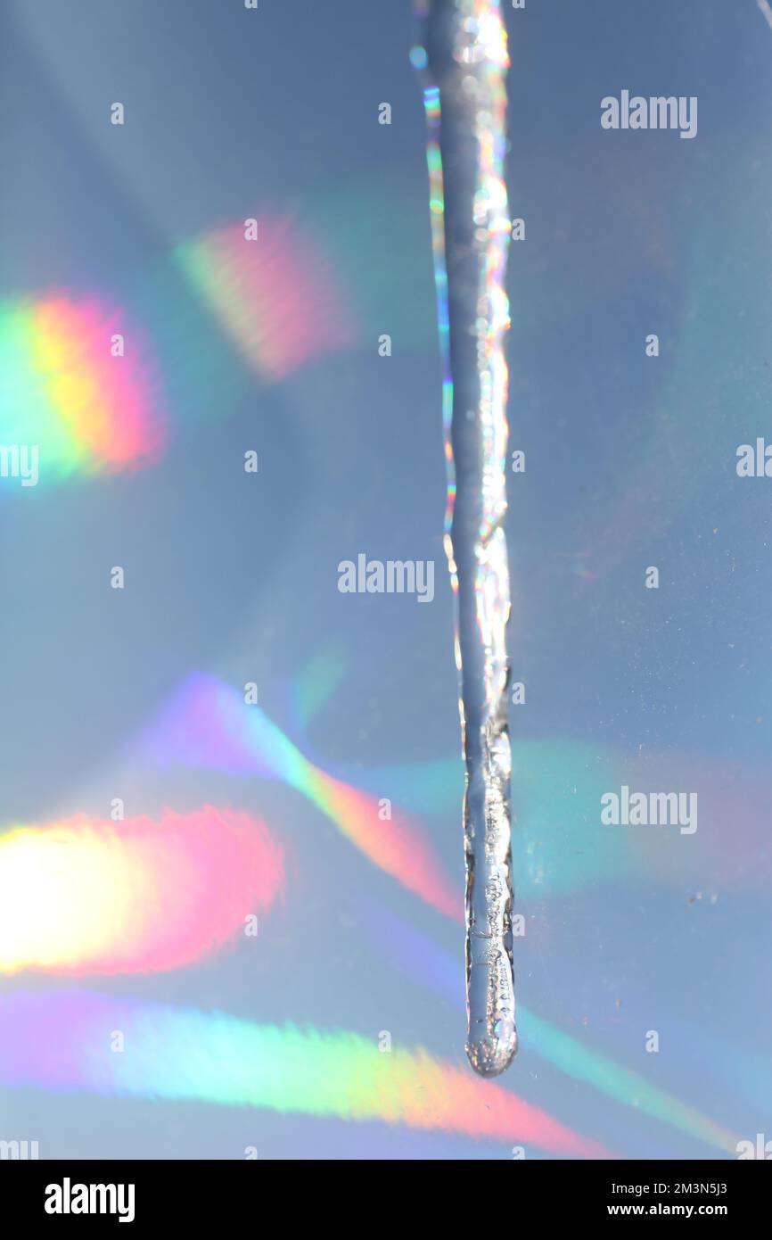 icicles are melting in colorful light Stock Photo - Alamy
