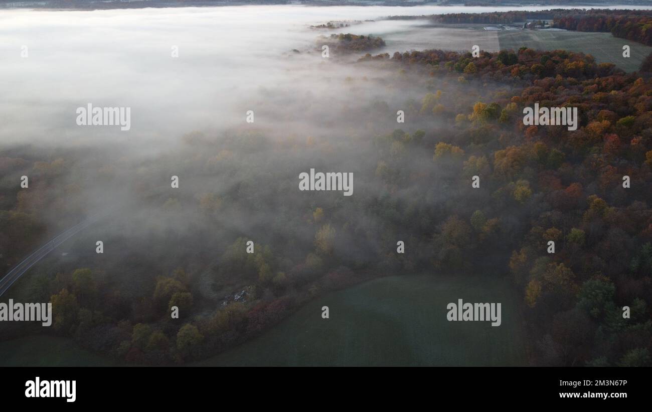Aerial view fog in valley hi-res stock photography and images - Alamy