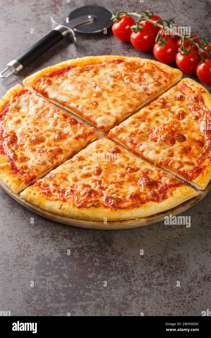 Authentic New York City Italian style pizzeria pizza pie closeup on the ...