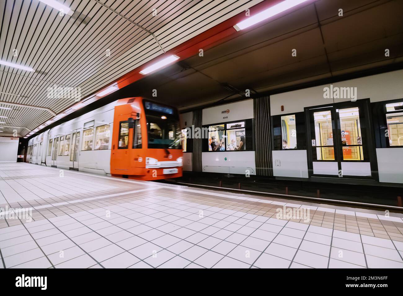 30 July 2022, Cologne, Germany: Motion blur of Arriving train in the ...