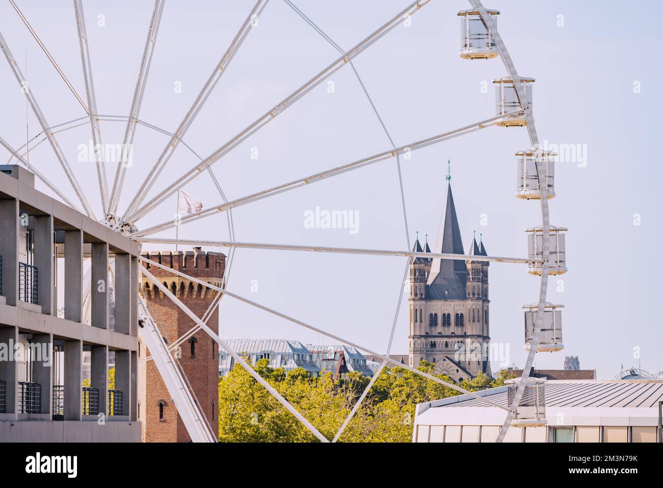 Ferris wheel in Cologne, Germany with a view of the main architectural ...