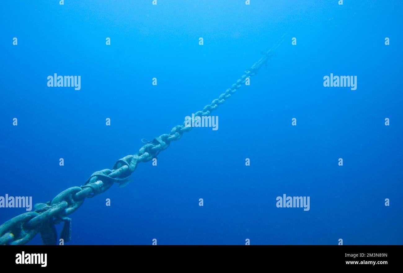 Chain Of The Anchored Ship In The Caribbean Sea. Blue Water. Relaxed ...