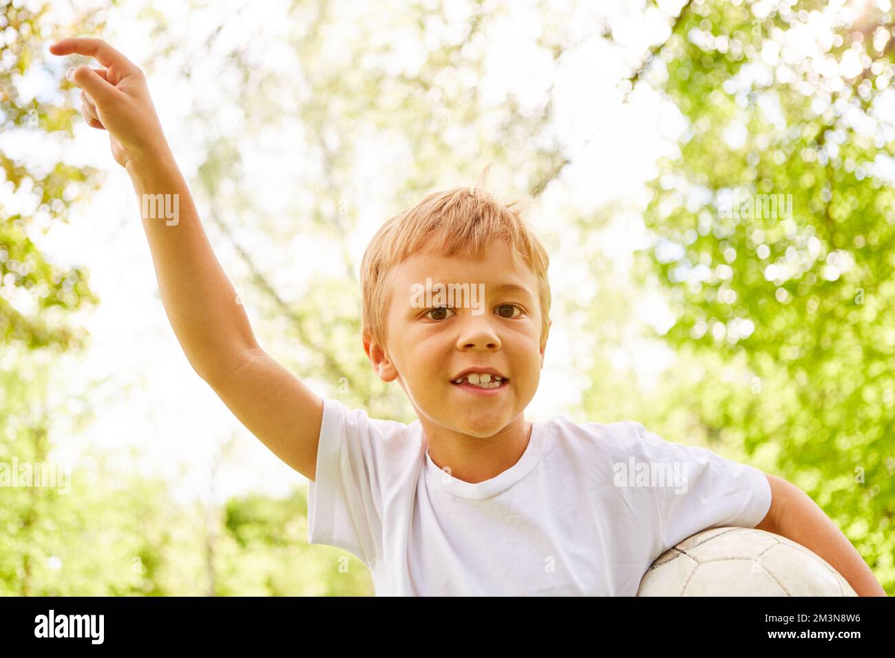 Kid celebrating football hi-res stock photography and images - Alamy
