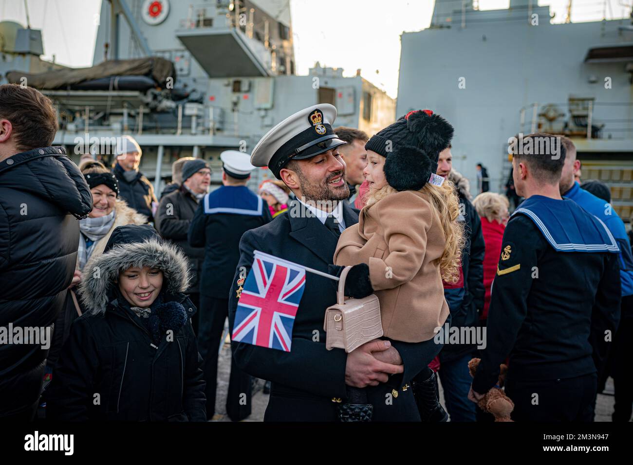 Sailors hold their families as loved ones greet the return of HMS ...