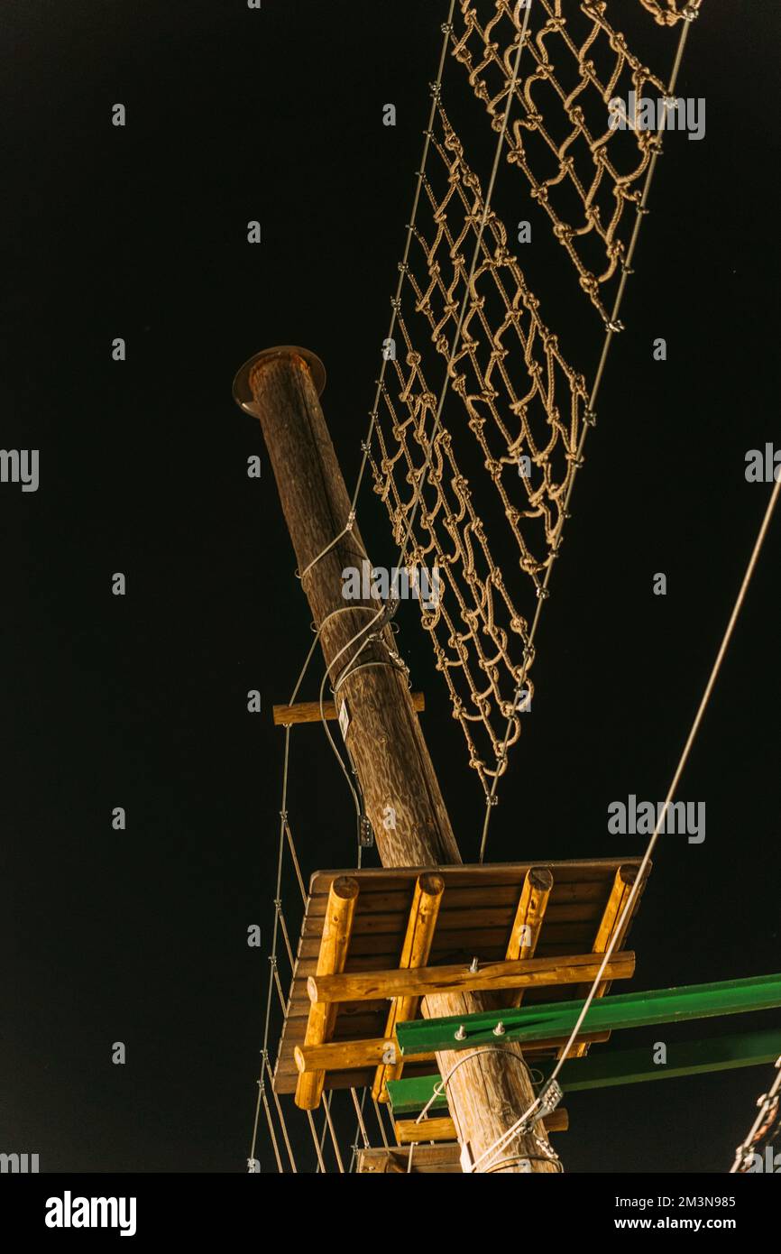 Fun and hard adventure park captured in the nighttime Stock Photo - Alamy