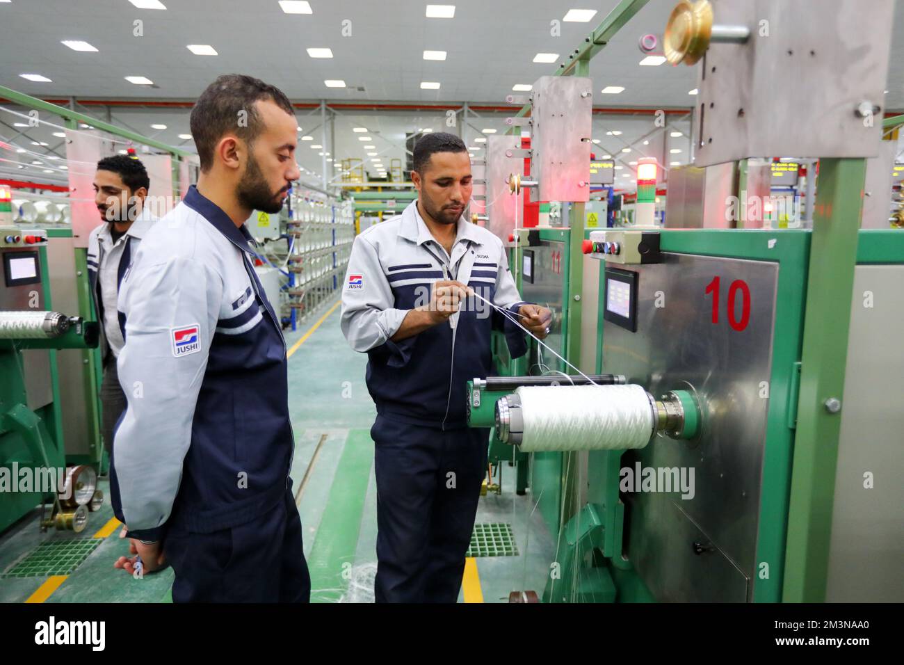Suez, Egypt. 15th Dec, 2022. Workers work on the new fiberglass ...