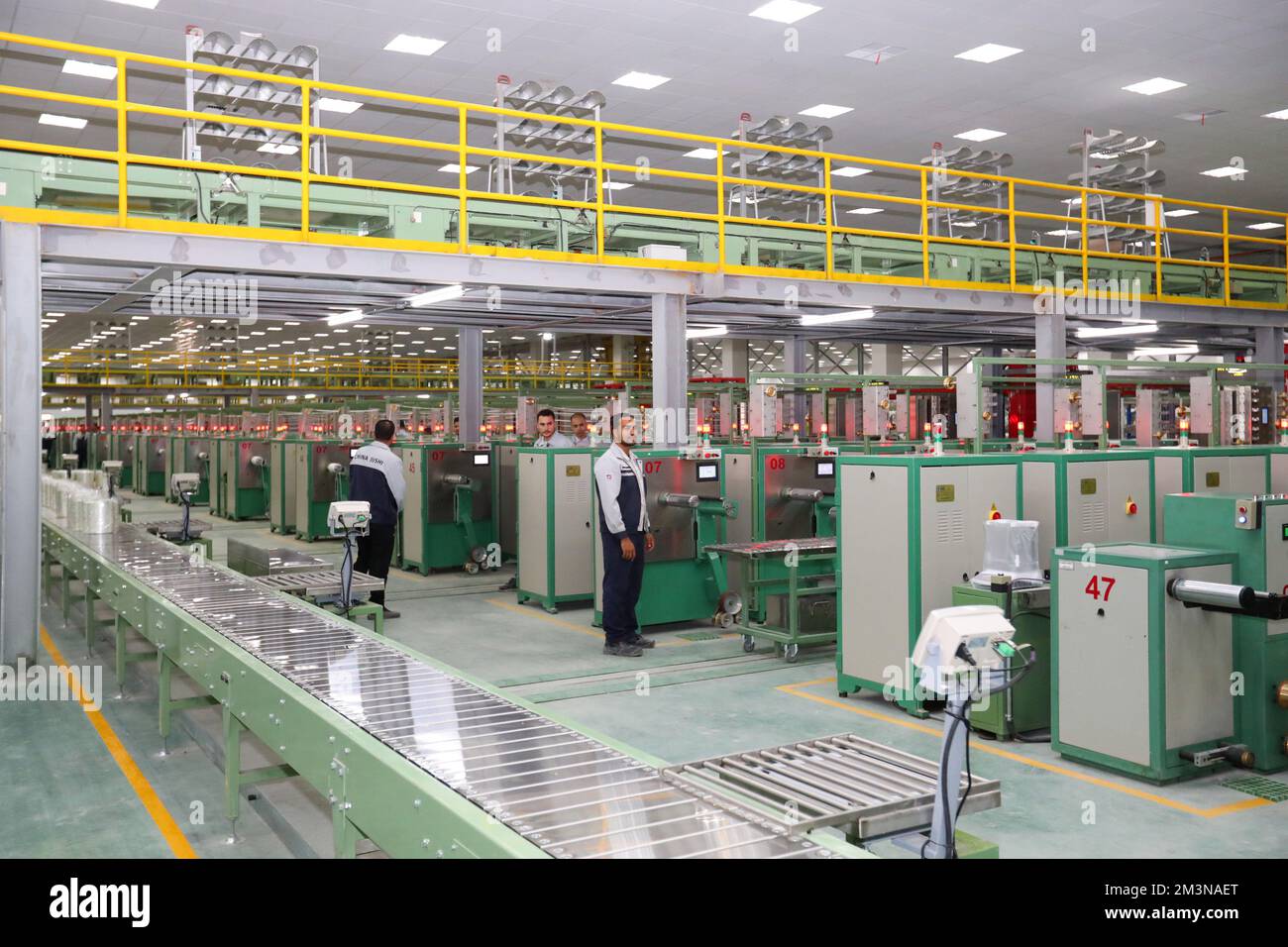 Suez, Egypt. 15th Dec, 2022. Workers work on the new fiberglass ...