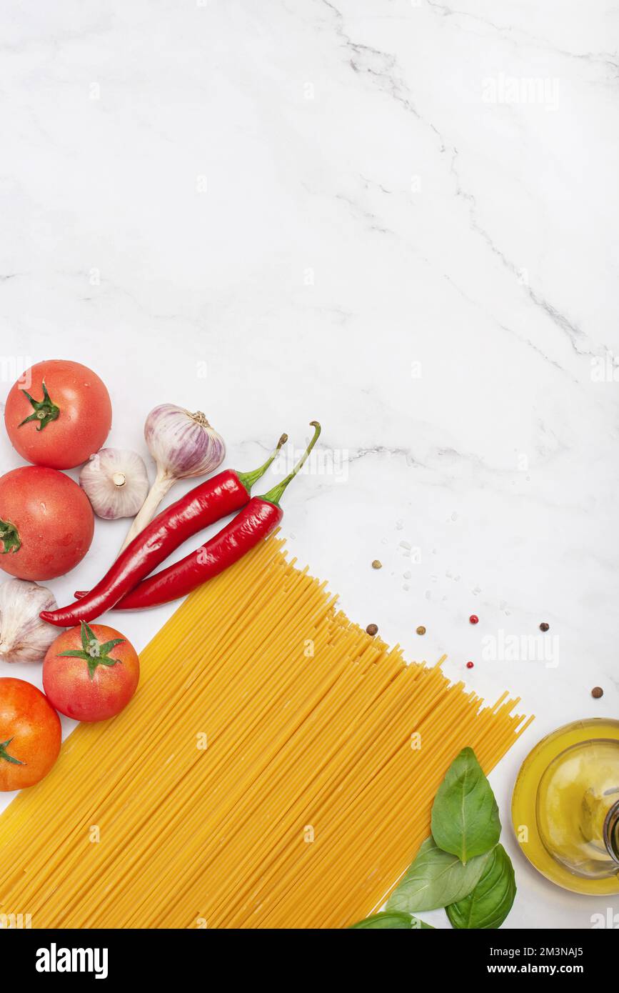 culinary background with pasta and vegetables. Food preparation ...