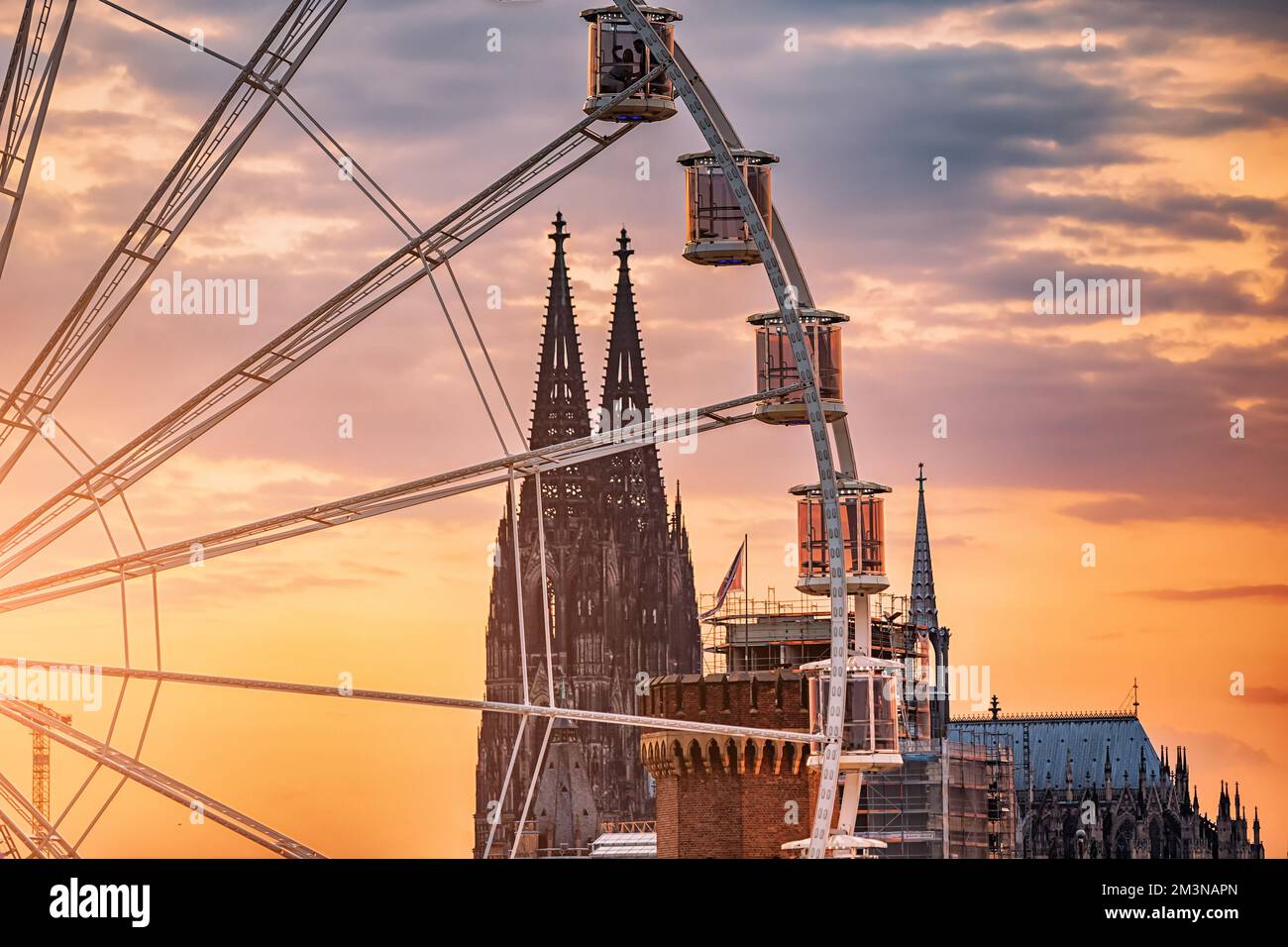 Ferris wheel in Cologne, Germany with a view of the main architectural ...