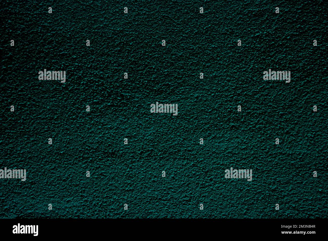 Teal colored abstract wall background with textures of different shades ...
