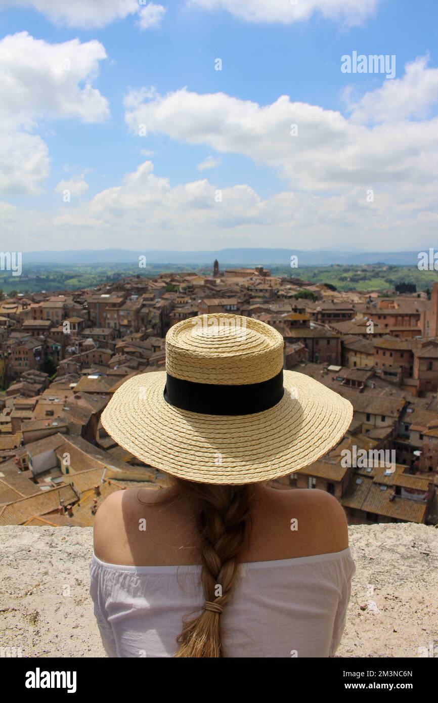 A vertical shot of a female wearing a straw hat Stock Photo - Alamy