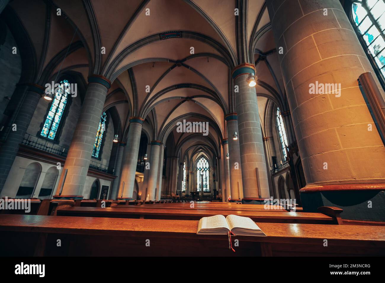 28 July 2022, Essen, Germany: Open Bible book in the interior of the ...