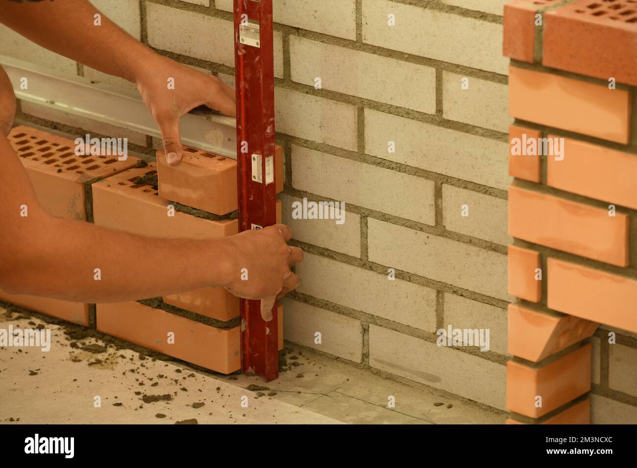 Closeup person laying bricks hi-res stock photography and images - Alamy