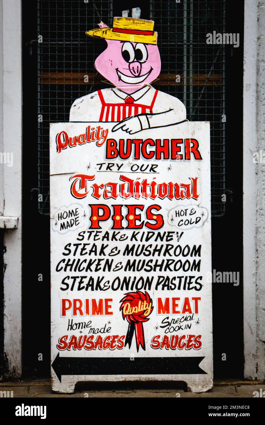 Outdoor advertising sign of British butcher promoting meat, steak ...